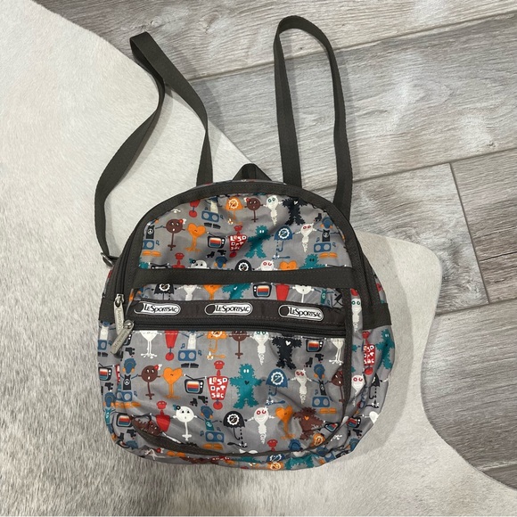 Lesportsac | Bags | Lesportsac Mini Backpack Retired Robot Print | Poshmark